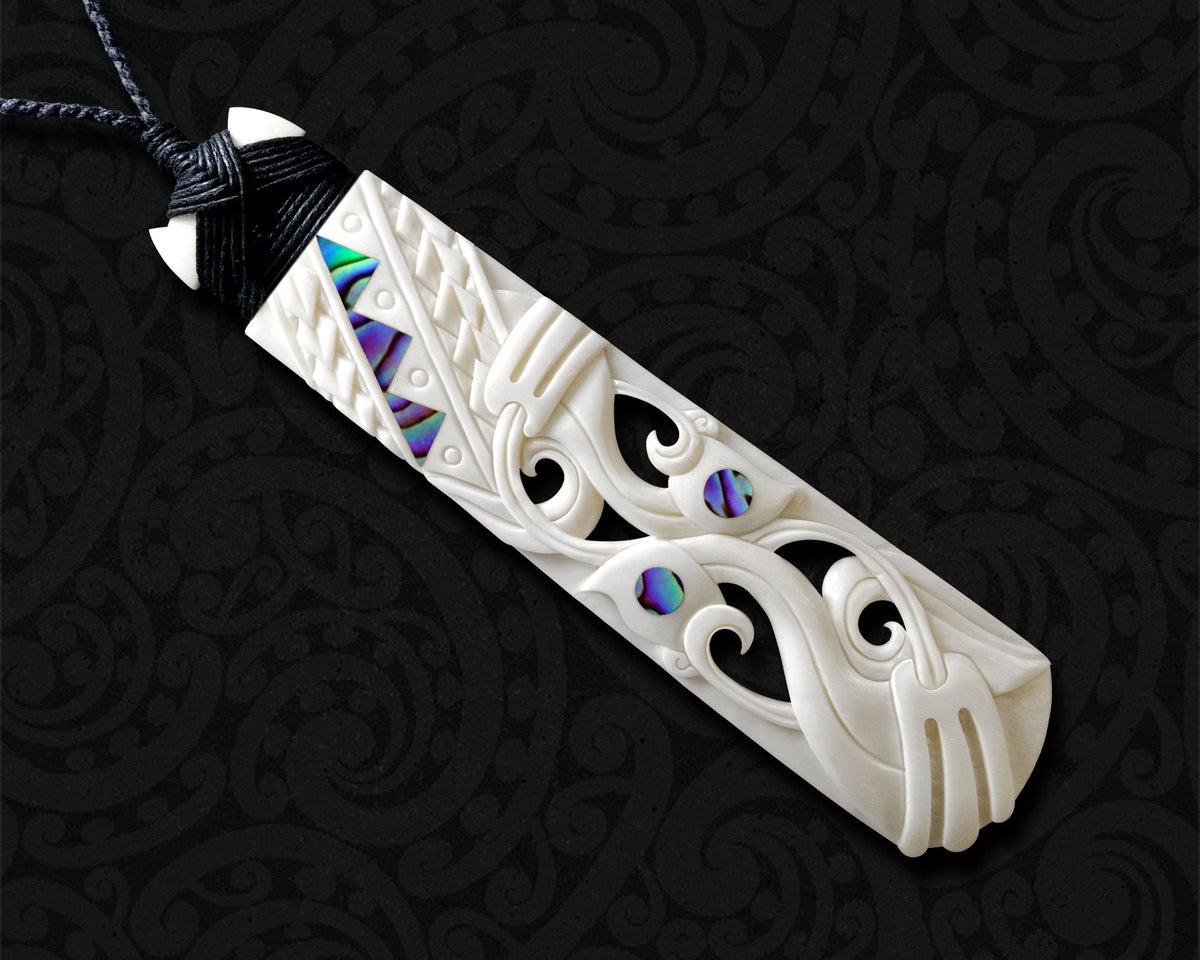 Medium Hand Carved Maori Bone Hei Toki with Paua Shell Inlay – Toa Bone
